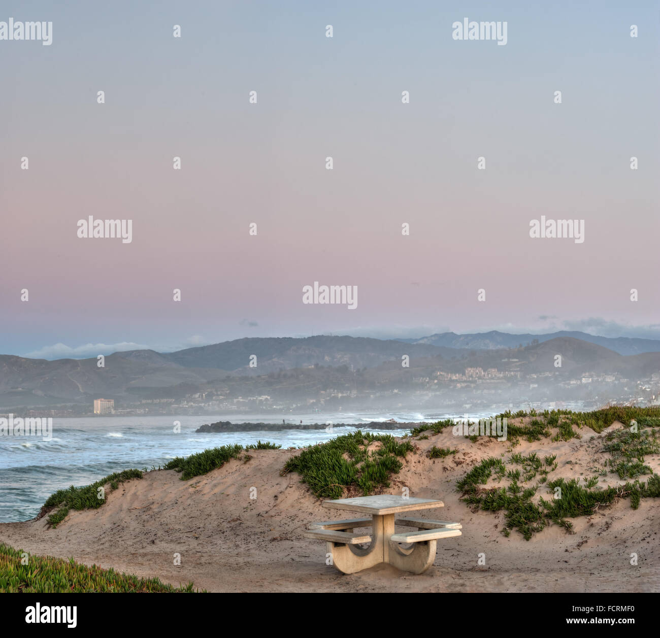 Lone picnic table against the sand dunes Stock Photo - Alamy