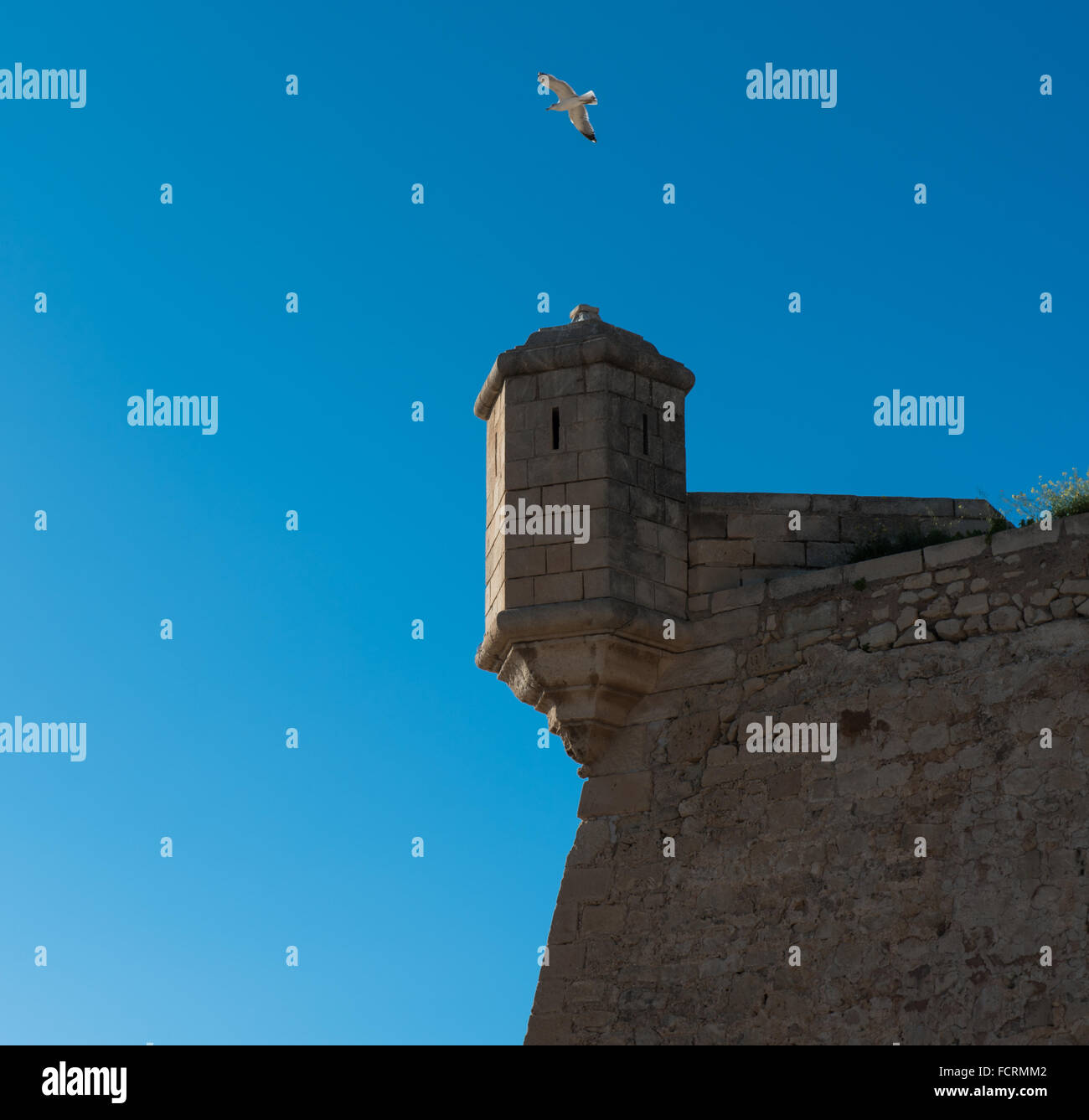 Turret against blue sky background Stock Photo - Alamy