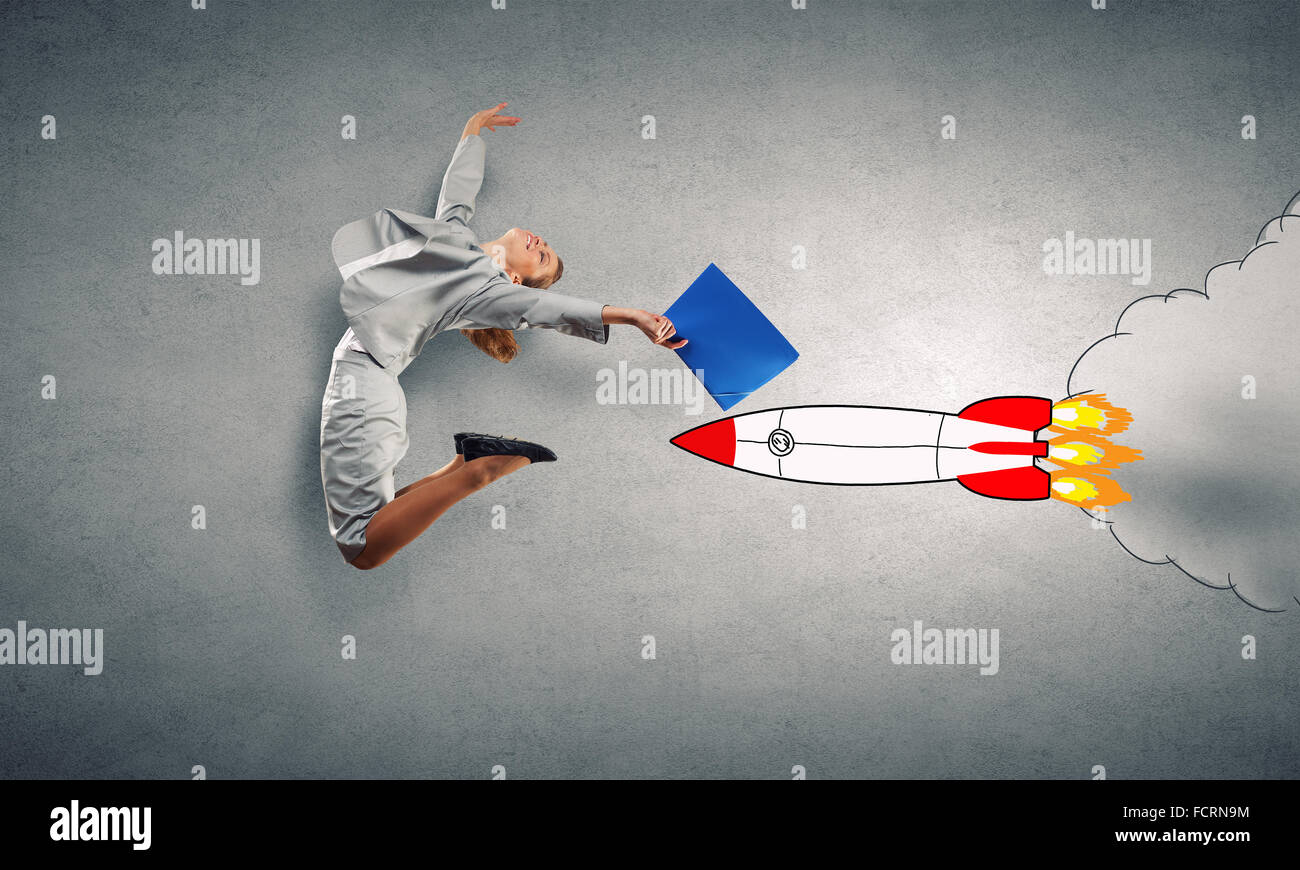 Young speedy businesswoman running in a hurry Stock Photo - Alamy