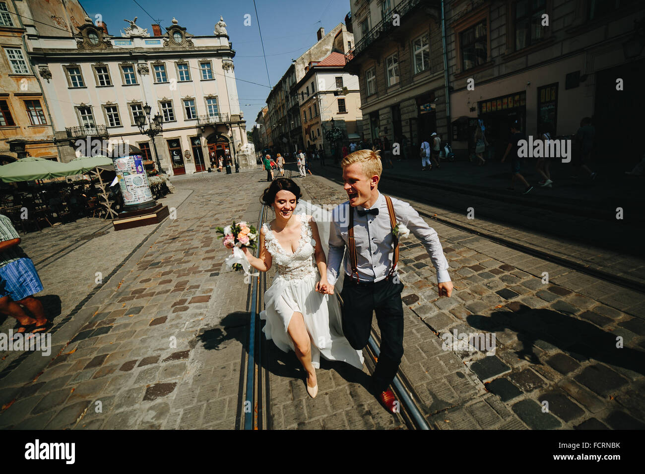 Bride and groom running hi-res stock photography and images - Alamy