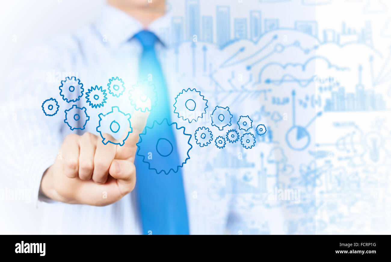 Close businessman touching gear mechanism hi-res stock photography and ...