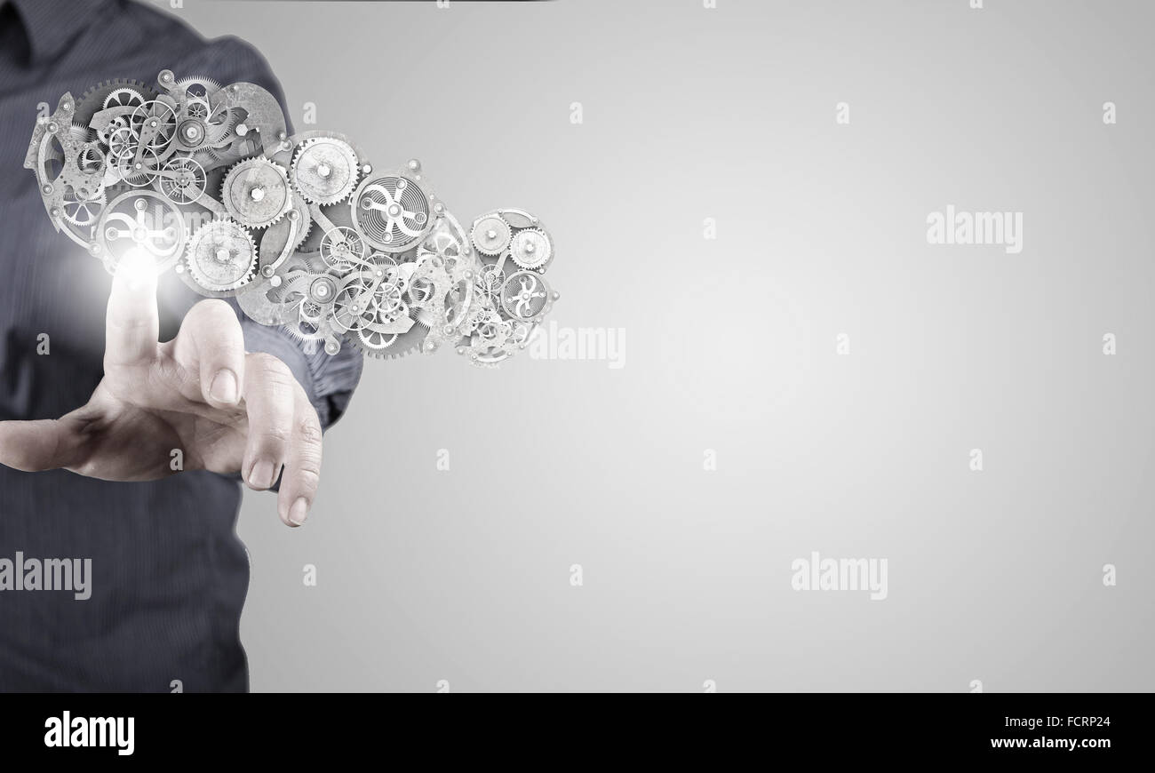 Close businessman touching gear mechanism hi-res stock photography and ...
