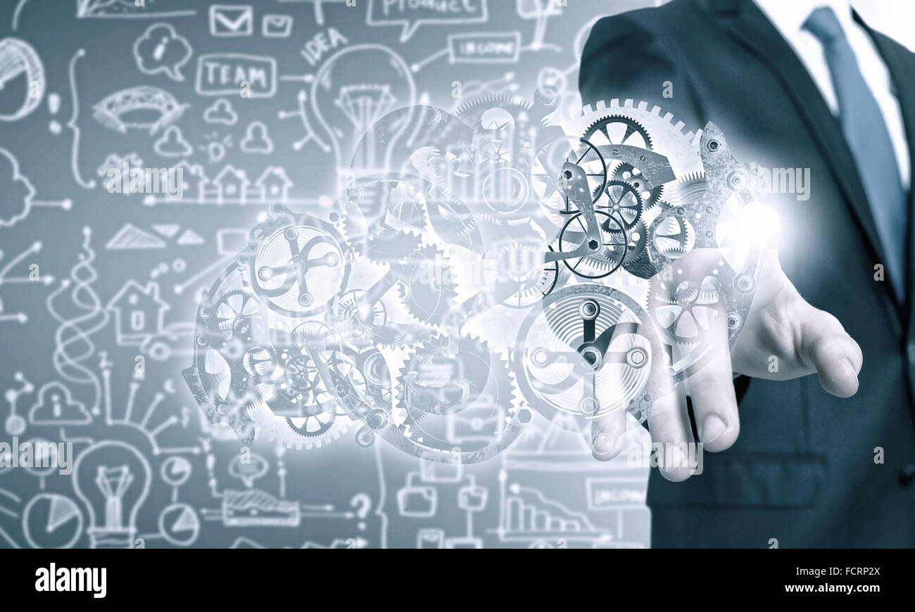 Close businessman touching gear mechanism hi-res stock photography and ...