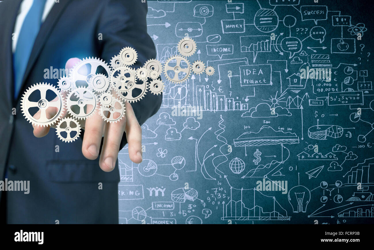 Close businessman touching gear mechanism hi-res stock photography and ...