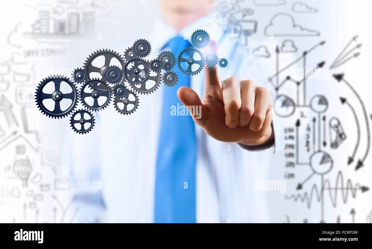 Close businessman touching gear mechanism hi-res stock photography and ...