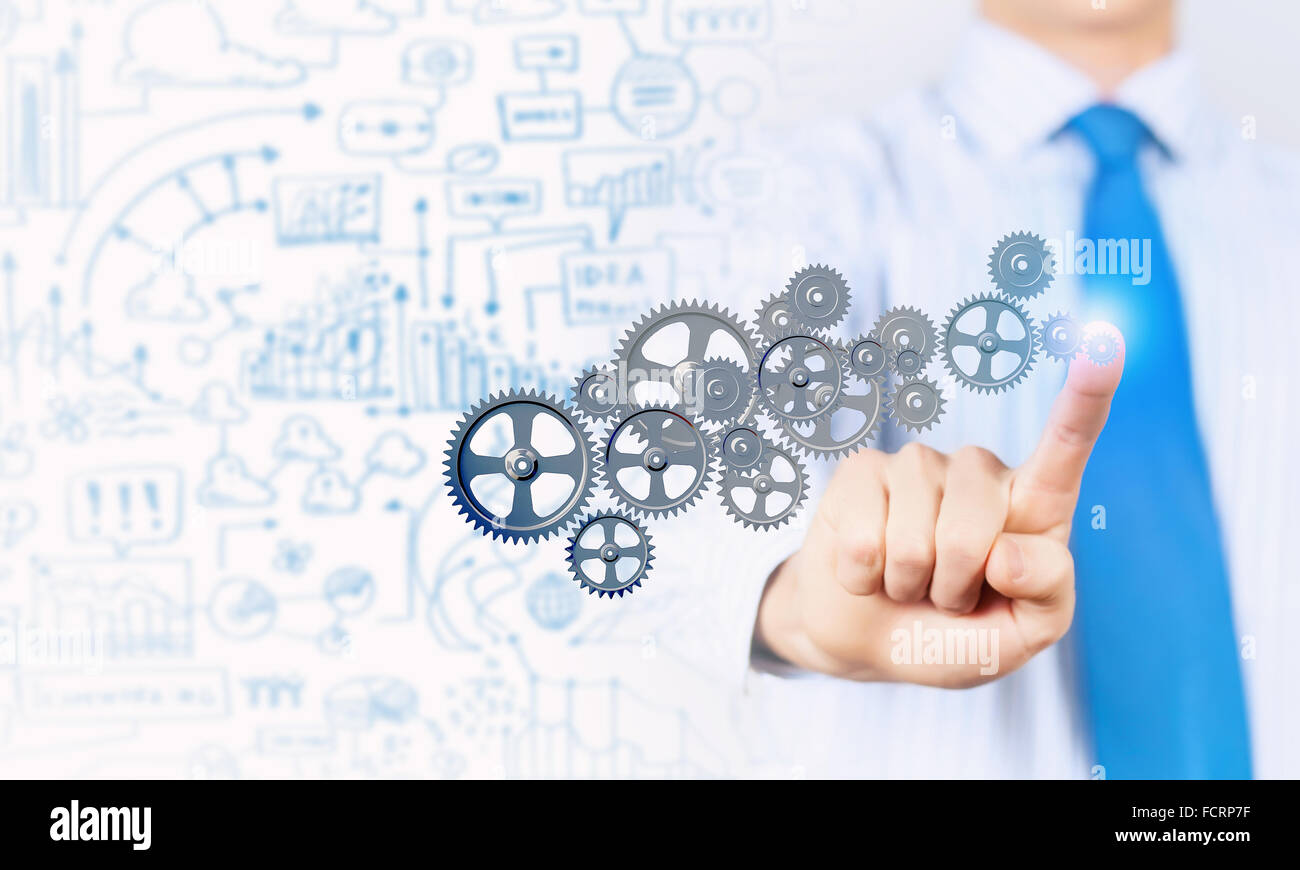 Close businessman touching gear mechanism hi-res stock photography and ...