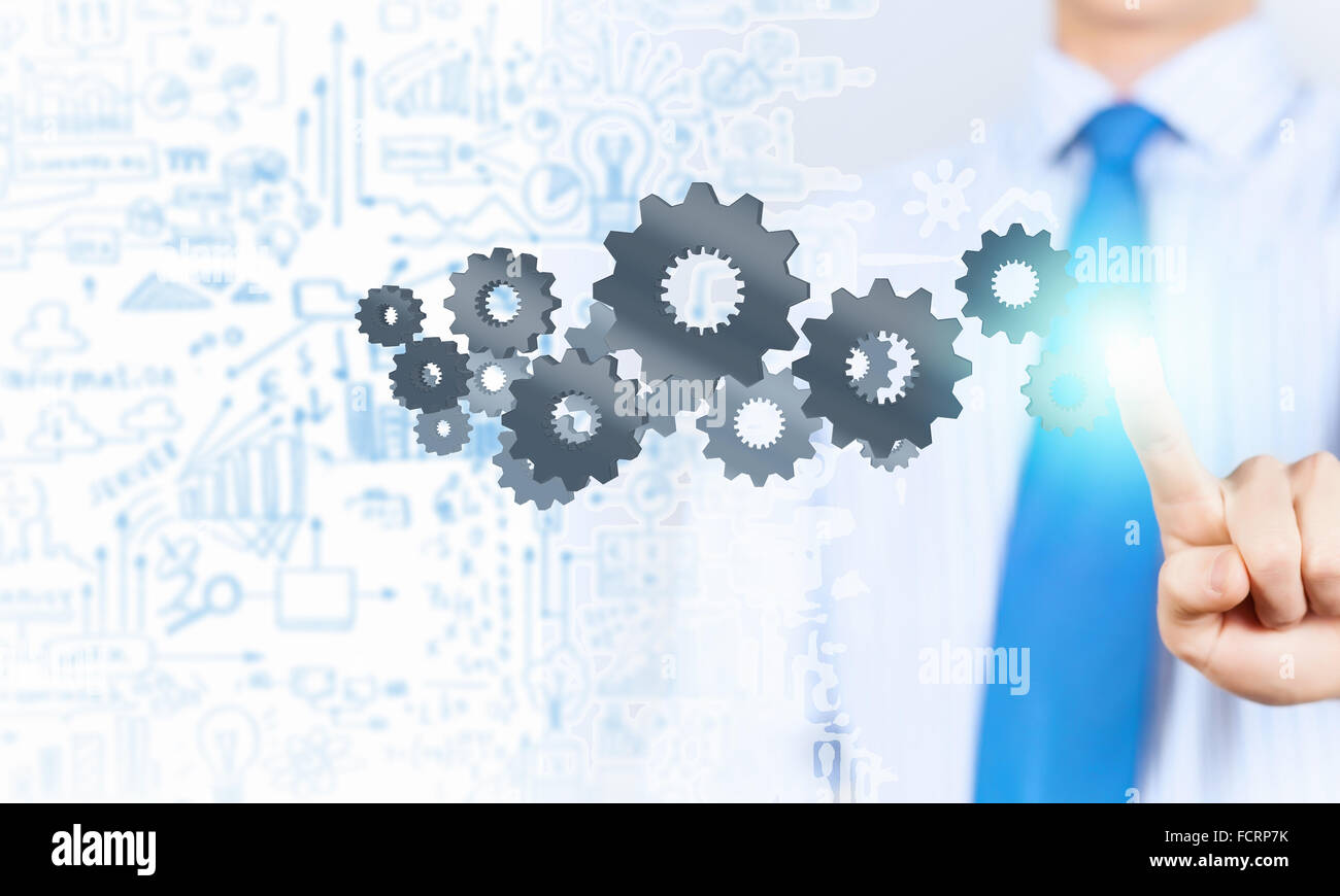 Close businessman touching gear mechanism hi-res stock photography and ...