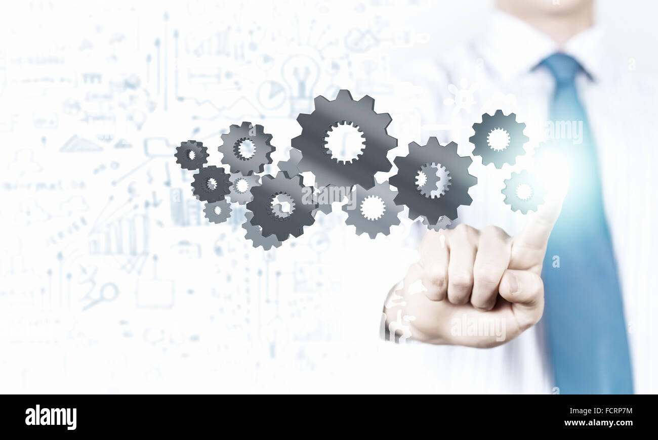 Close businessman touching gear mechanism hi-res stock photography and ...