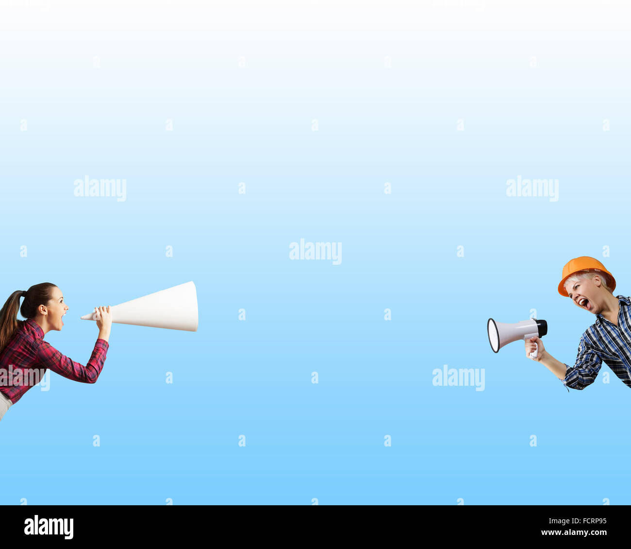 Young people screaming at each other in trumpet Stock Photo - Alamy