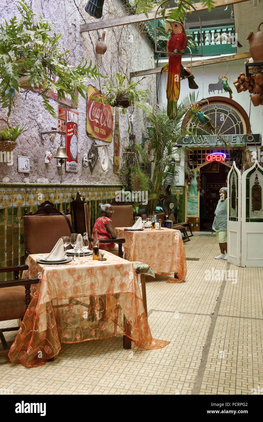 Interior decor of San Cristobal paladar (restaurant), Havana, Cuba ...