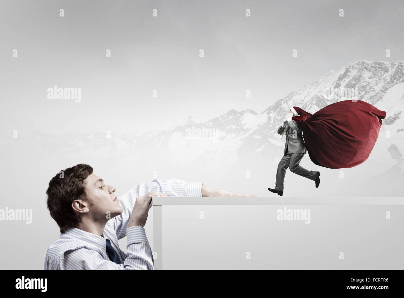 Man looking under table on hi-res stock photography and images - Alamy