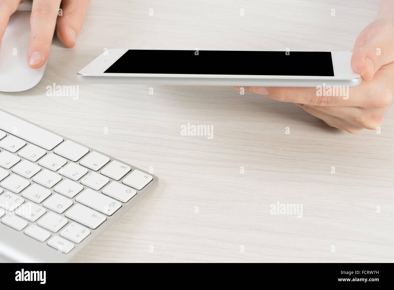 Hands holding ipad isolated hi-res stock photography and images - Alamy
