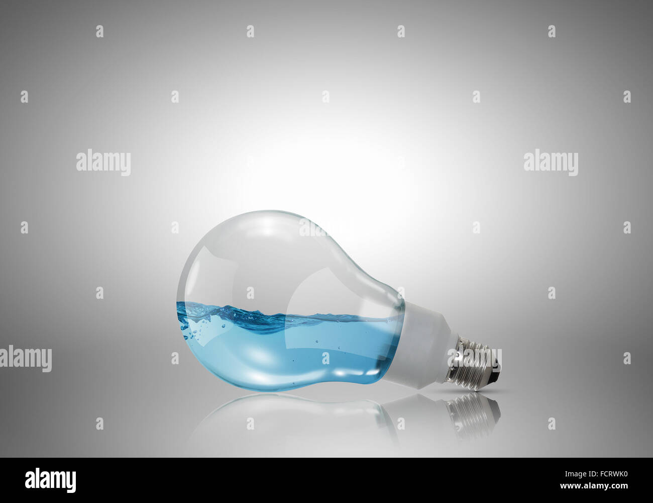 Conceptual image with light bulb filled with clear water Stock Photo ...