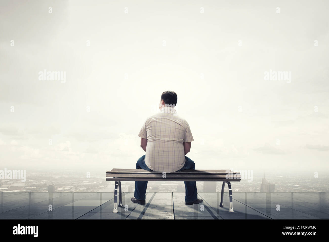 Fat man sitting on bench hi-res stock photography and images - Alamy