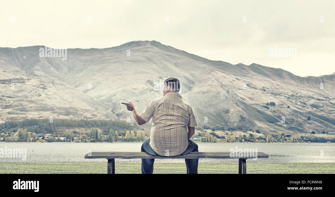 Back fat man sitting on hi-res stock photography and images - Alamy
