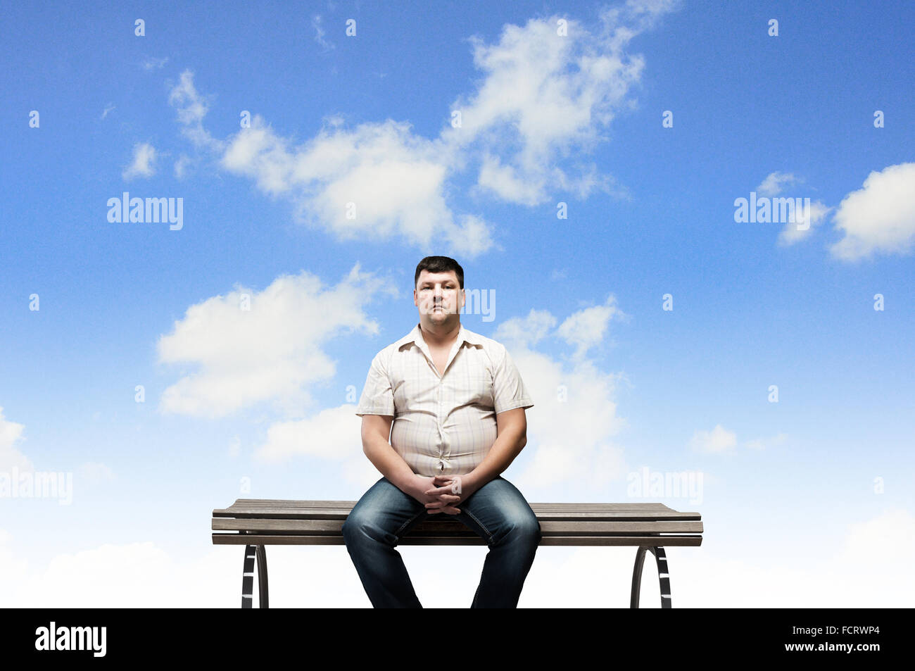 Fat man sitting on bench hi-res stock photography and images - Alamy