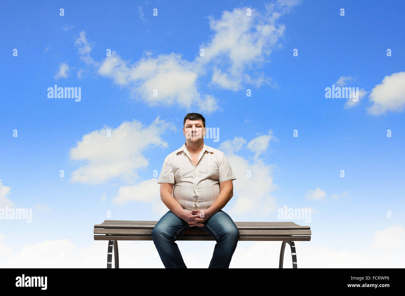 Fat man sitting on bench hi-res stock photography and images - Alamy