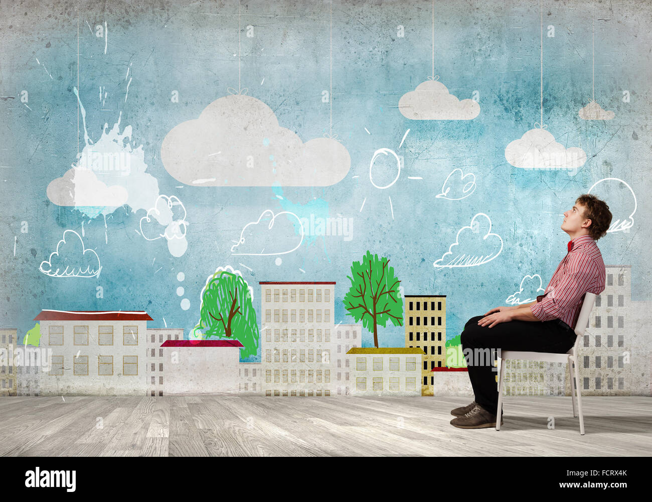 Young funny teenager guy sitting in chair Stock Photo - Alamy