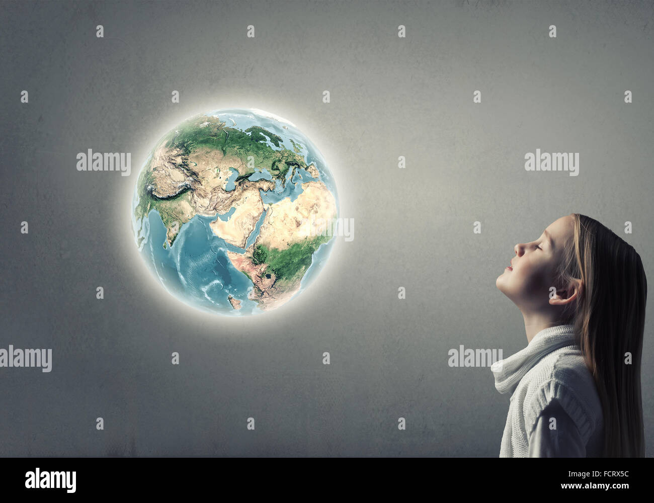 Side view of cute girl and Earth planet above her head. Elements of ...