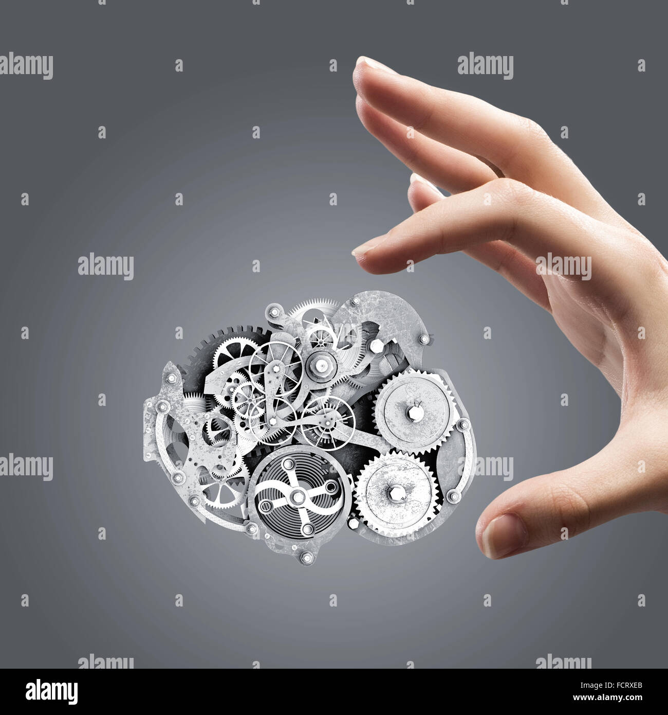 Close up human hand pointing at gears mechanism Stock Photo - Alamy