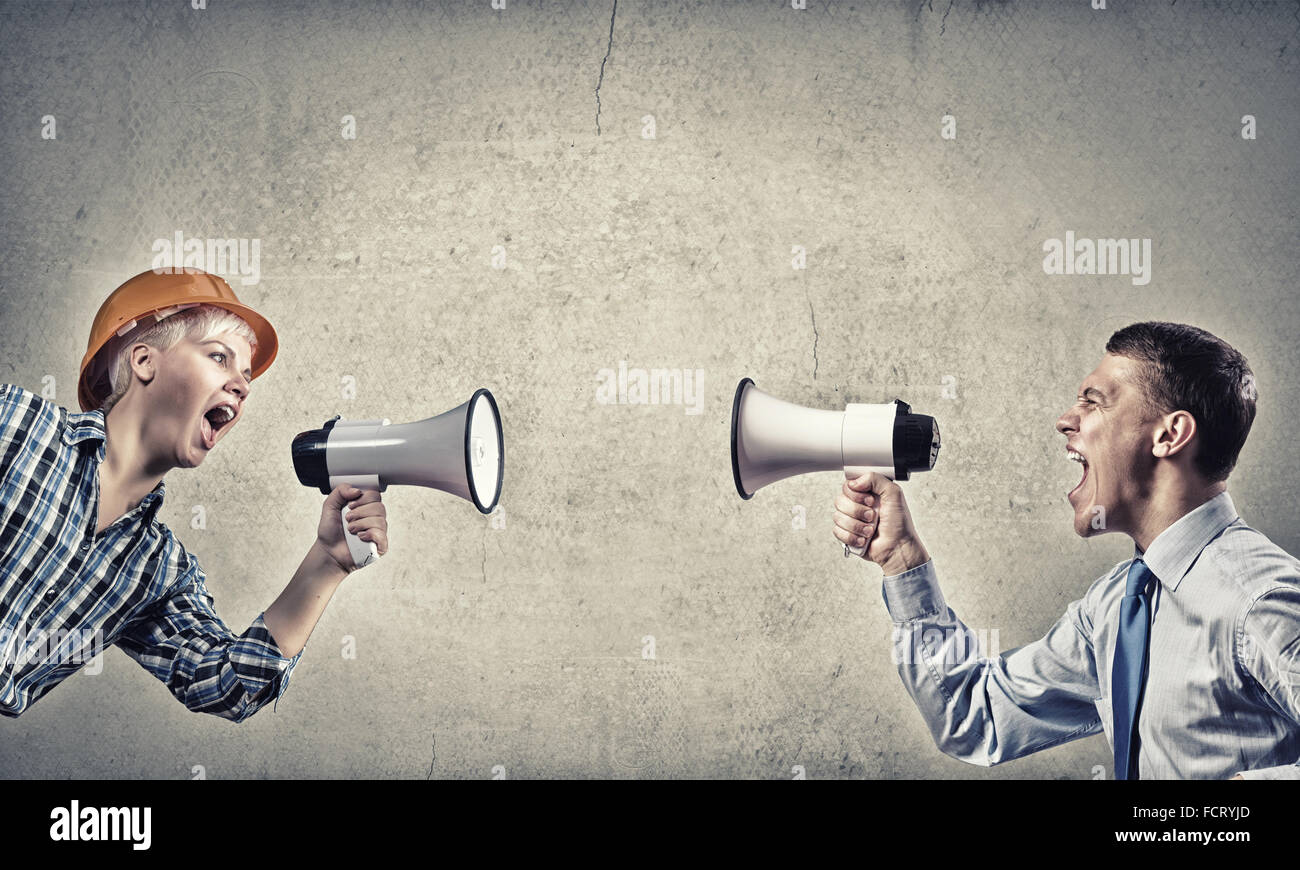 Young furious woman screaming agressively in megaphone Stock Photo - Alamy