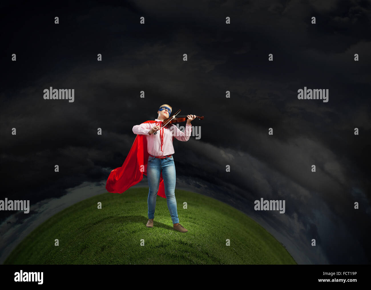 Young businesswoman in red cape hi-res stock photography and images - Alamy