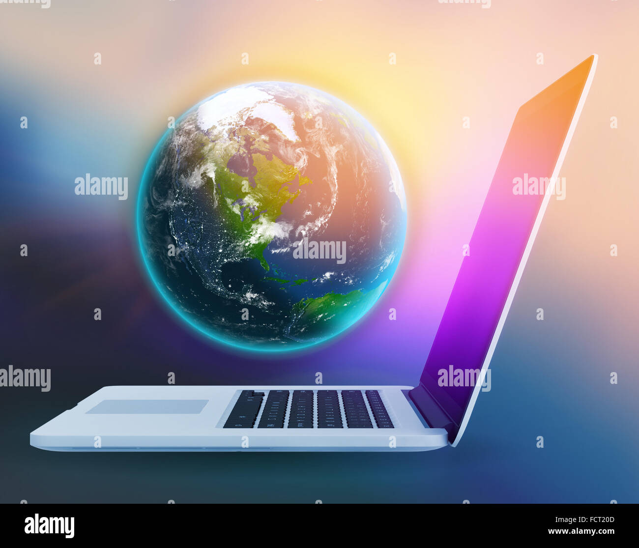 Laptop on Planet Earth colorful background Stock Photo - Alamy