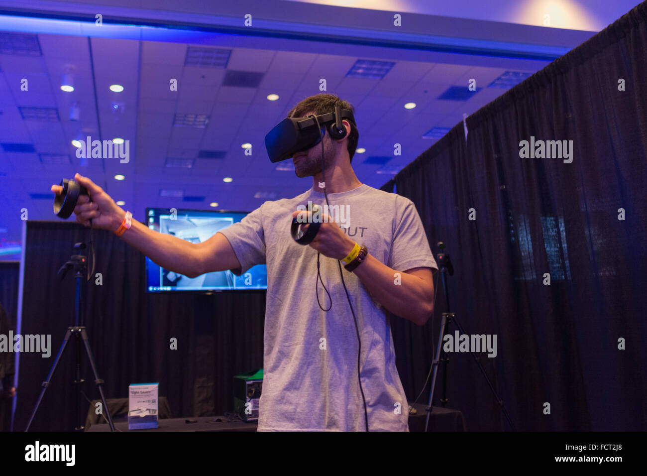Los Angeles, USA - January 23, 2016: Man tries virtual reality headset ...