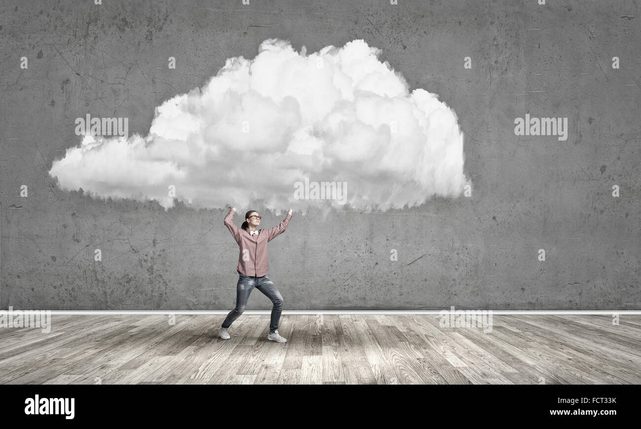 Young girl student carrying white huge cloud Stock Photo - Alamy