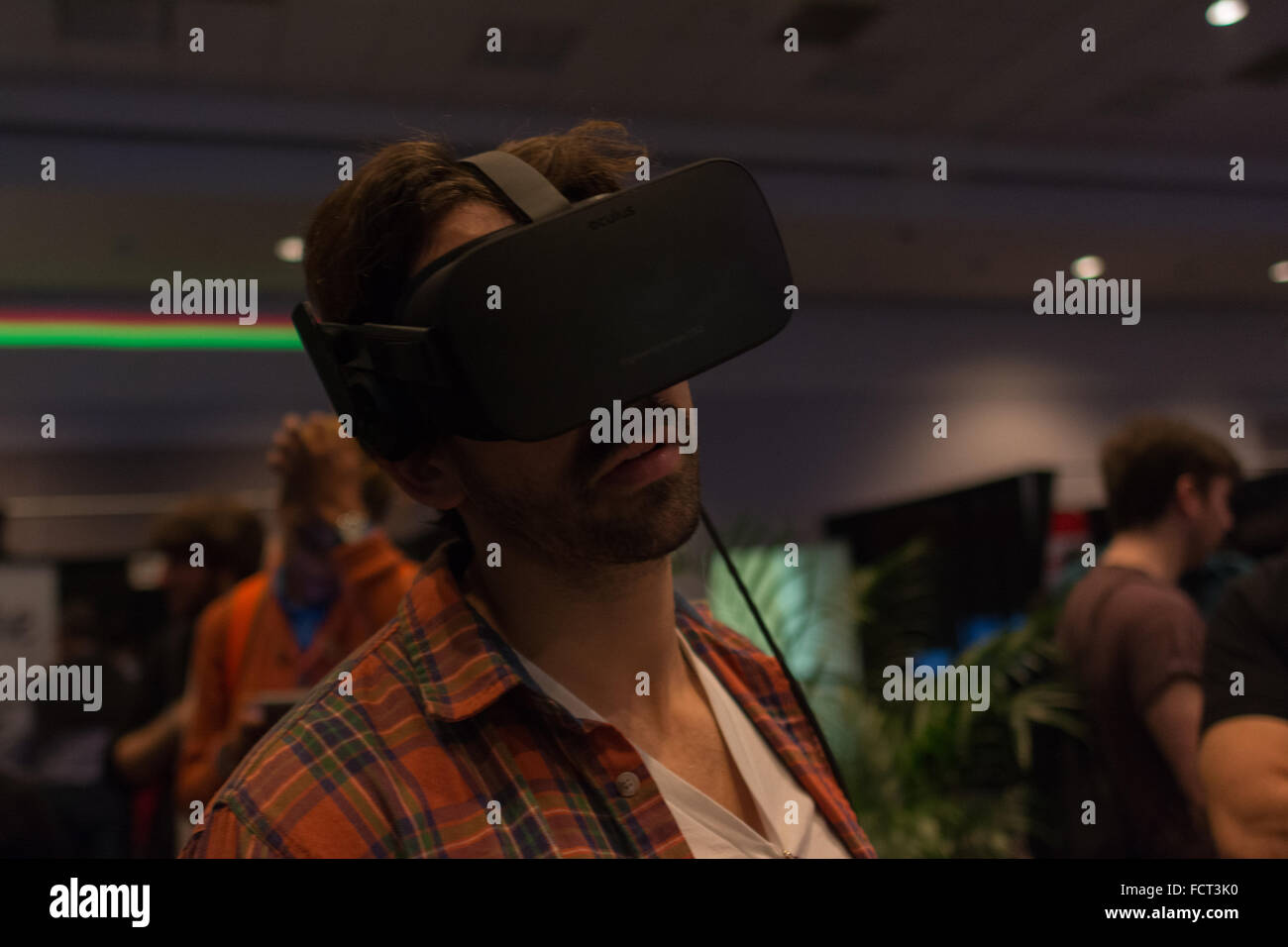 Los Angeles, USA - January 23, 2016: Man tries virtual reality headset ...