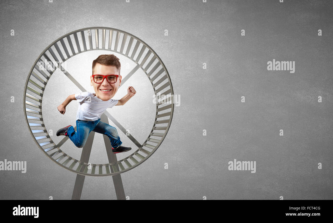 Funny picture of running in wheel man with big head over cement ...