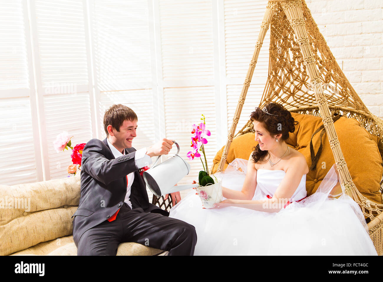 young bride and groom drinking tea Stock Photo - Alamy
