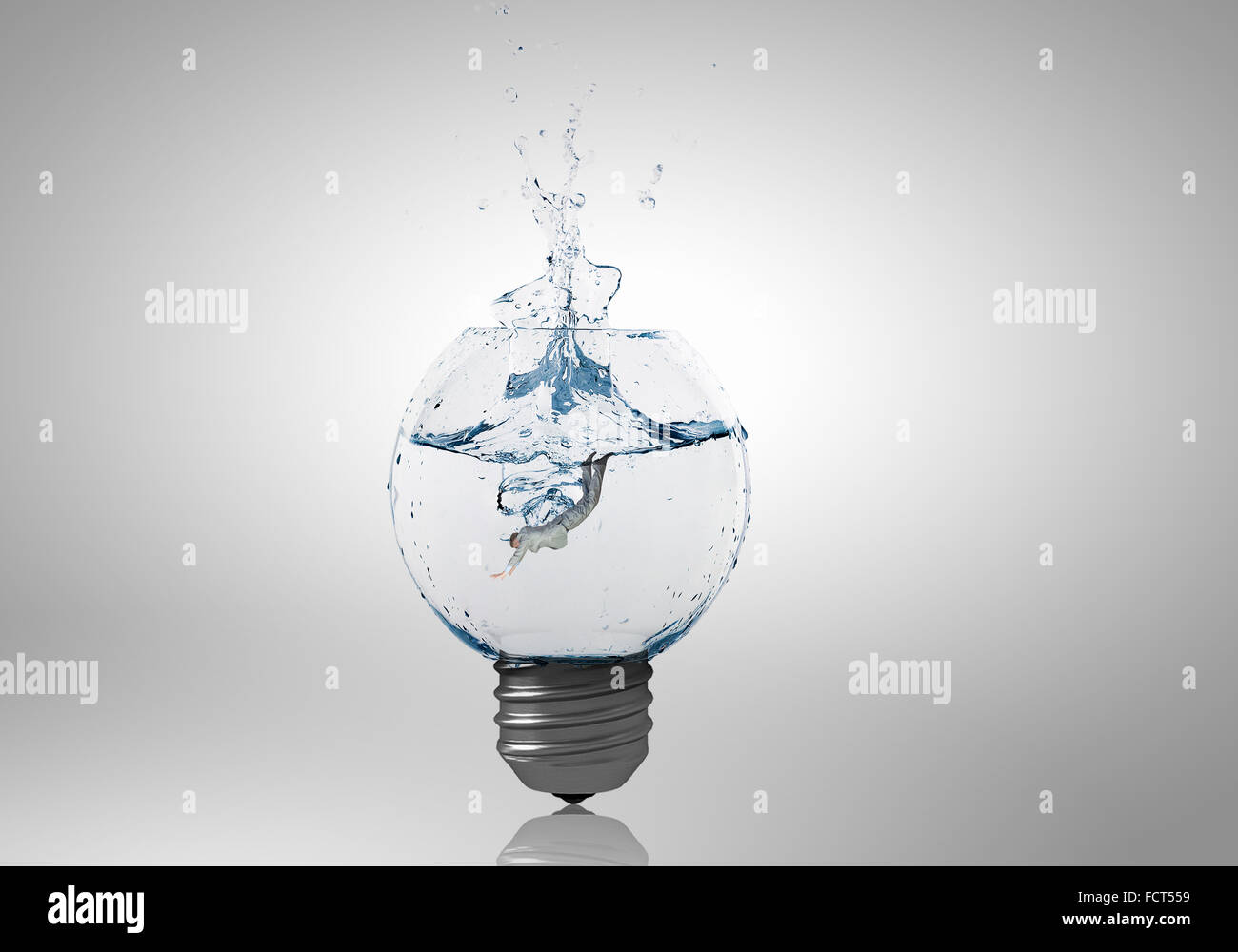 Conceptual image with light bulb filled with clear water and ...
