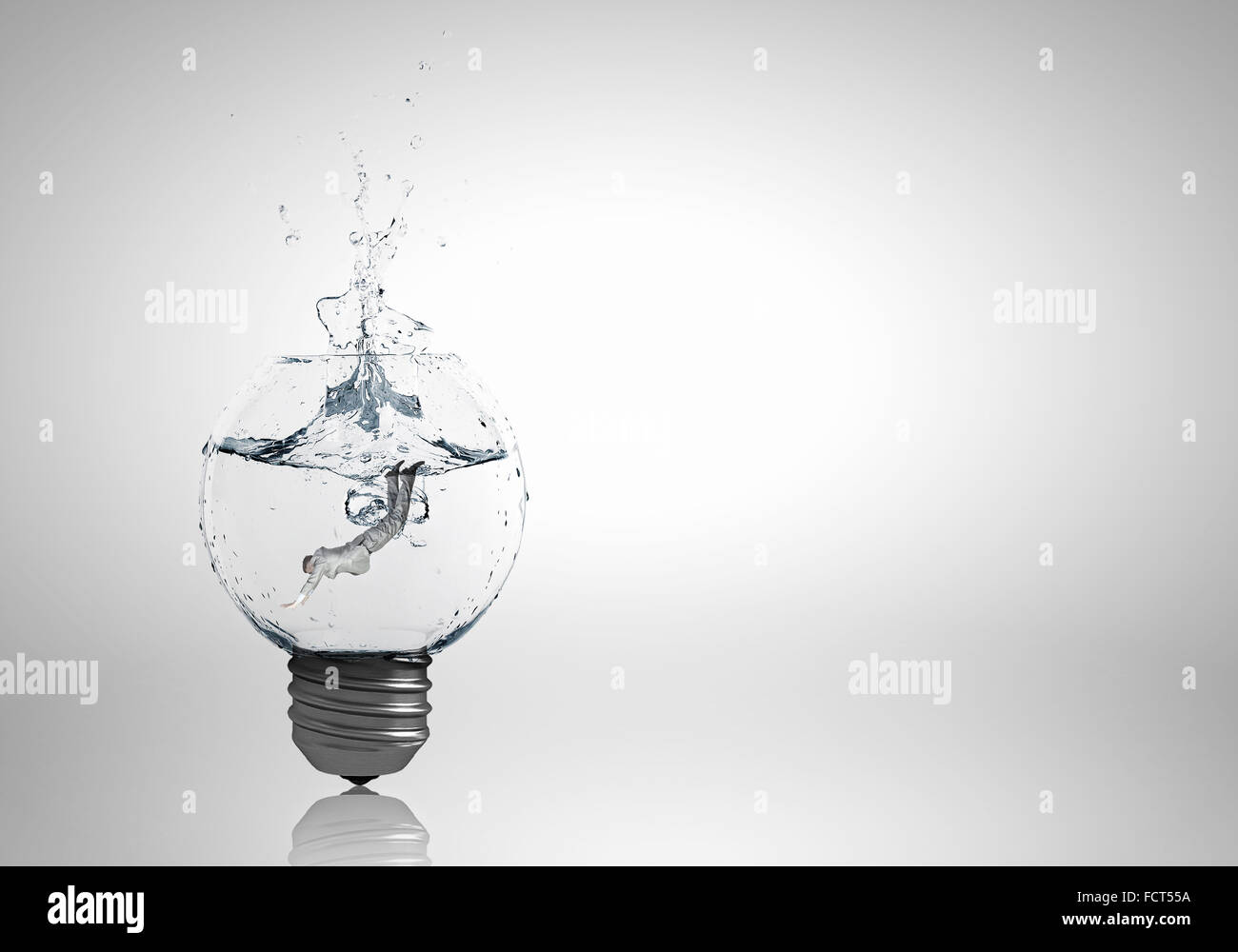 Conceptual image with light bulb filled with clear water and ...