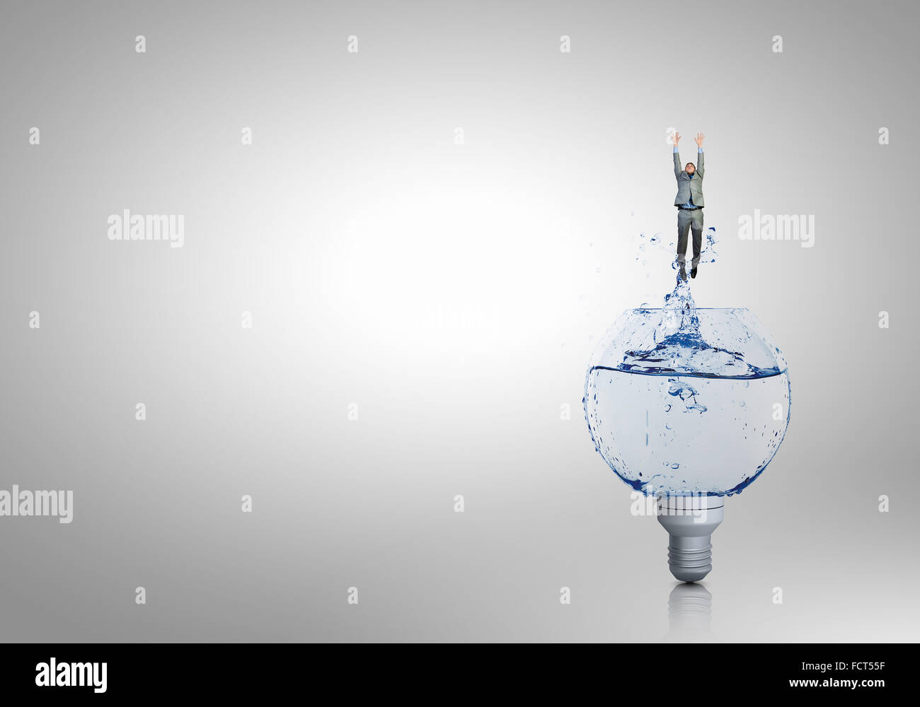 Conceptual image with light bulb filled with clear water and ...
