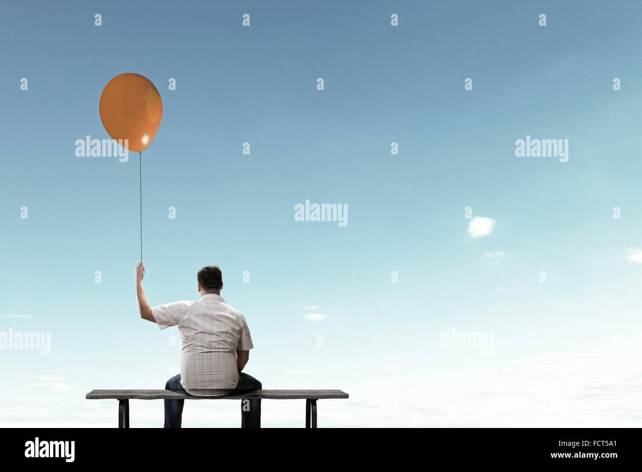 Fat man sitting on bench with his back with balloon in hand Stock Photo ...
