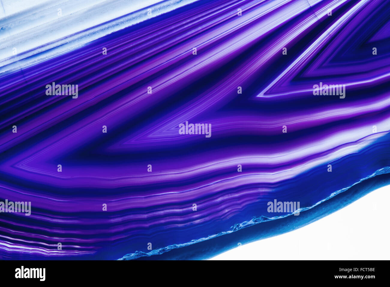 Detail view of a flat, polished and transparent slice of agate with ...