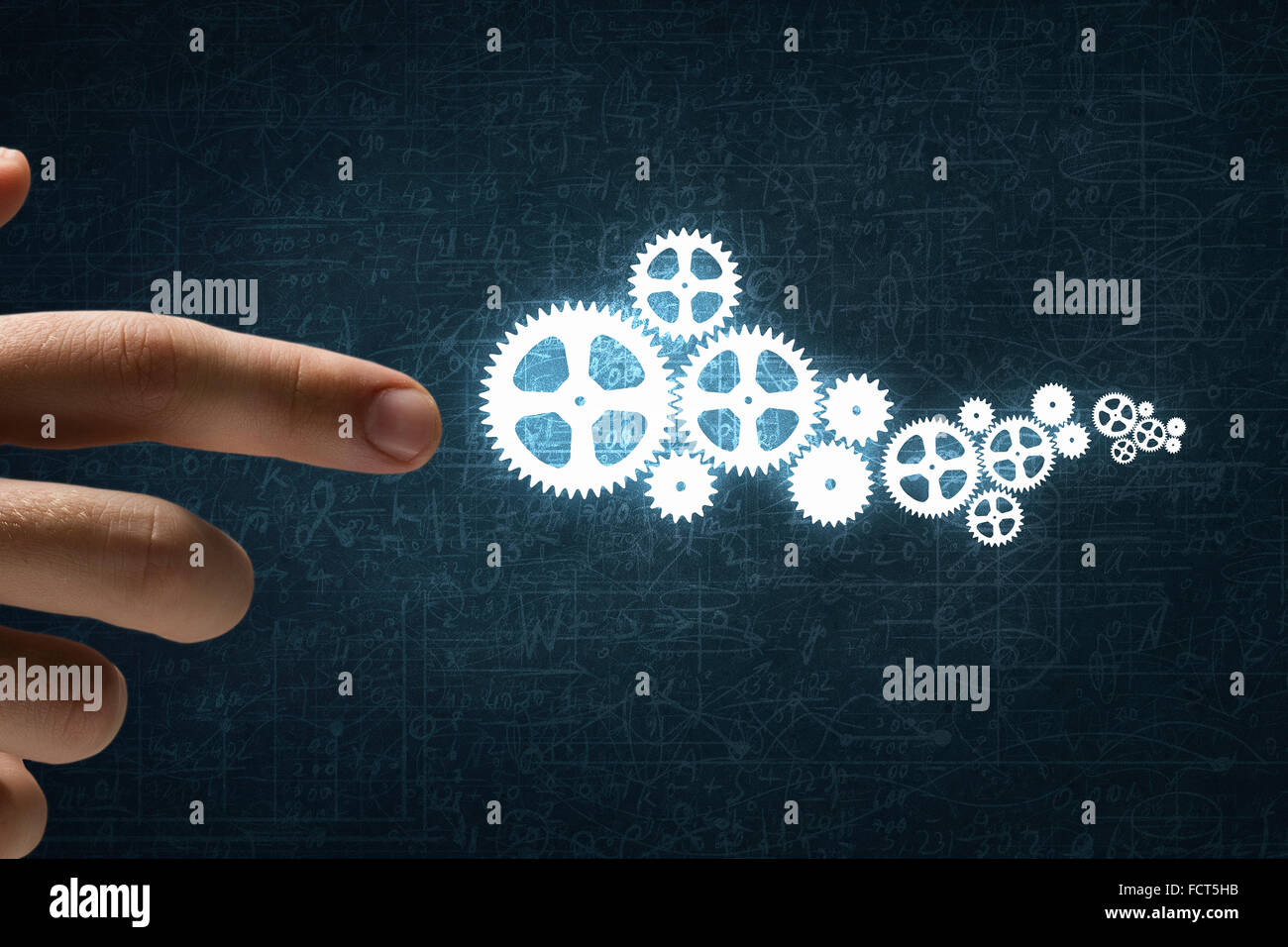 Close up of hand and gears mechanism on sketches background Stock Photo ...