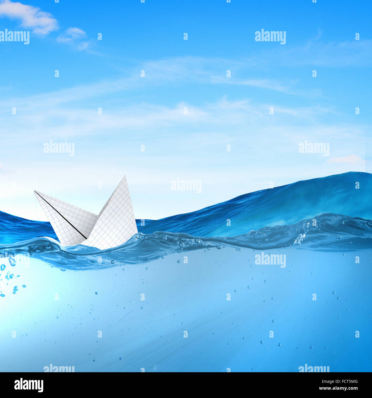 Boat made of paper sinking in blue water surface Stock Photo - Alamy