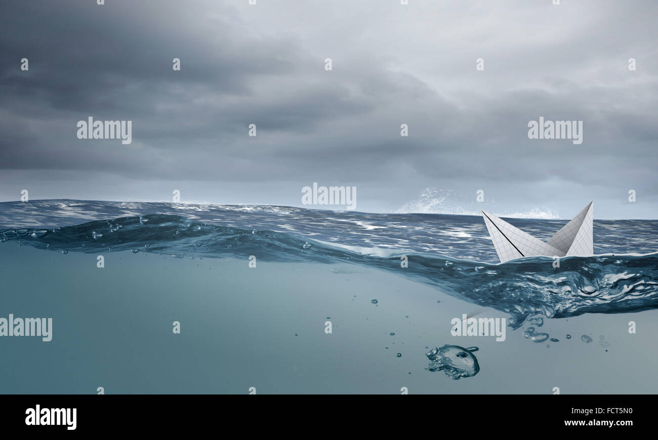 Boat made of paper sinking in blue water surface Stock Photo - Alamy
