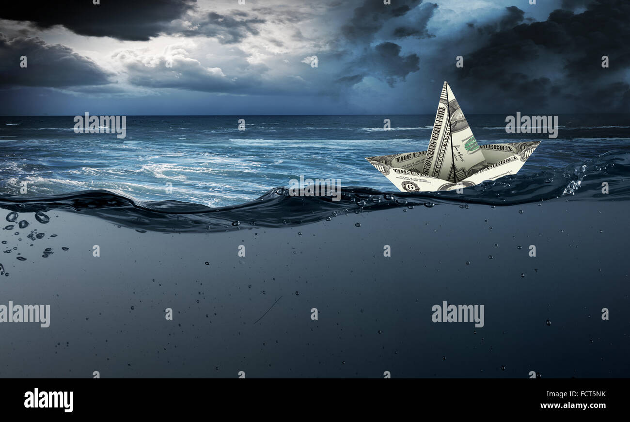 Ship made of dollar banknote floating in water Stock Photo - Alamy