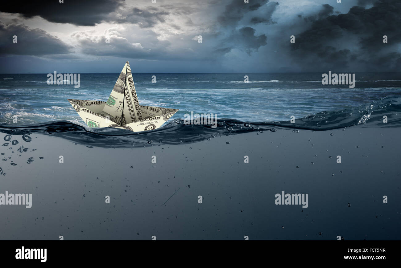 Ship made of dollar banknote floating in water Stock Photo - Alamy