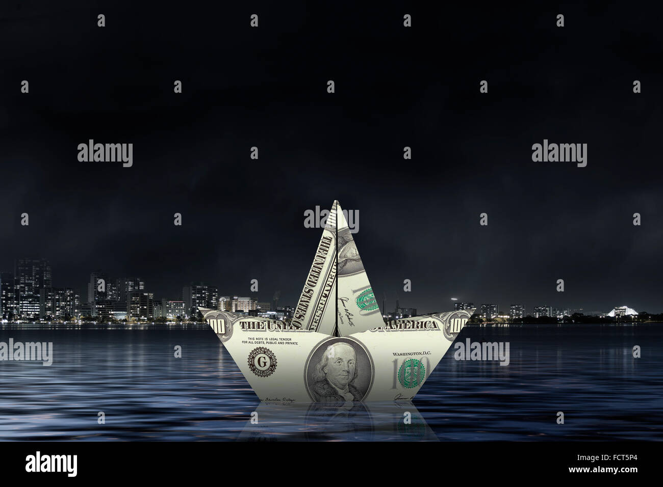 Ship made of dollar banknote floating in water Stock Photo - Alamy