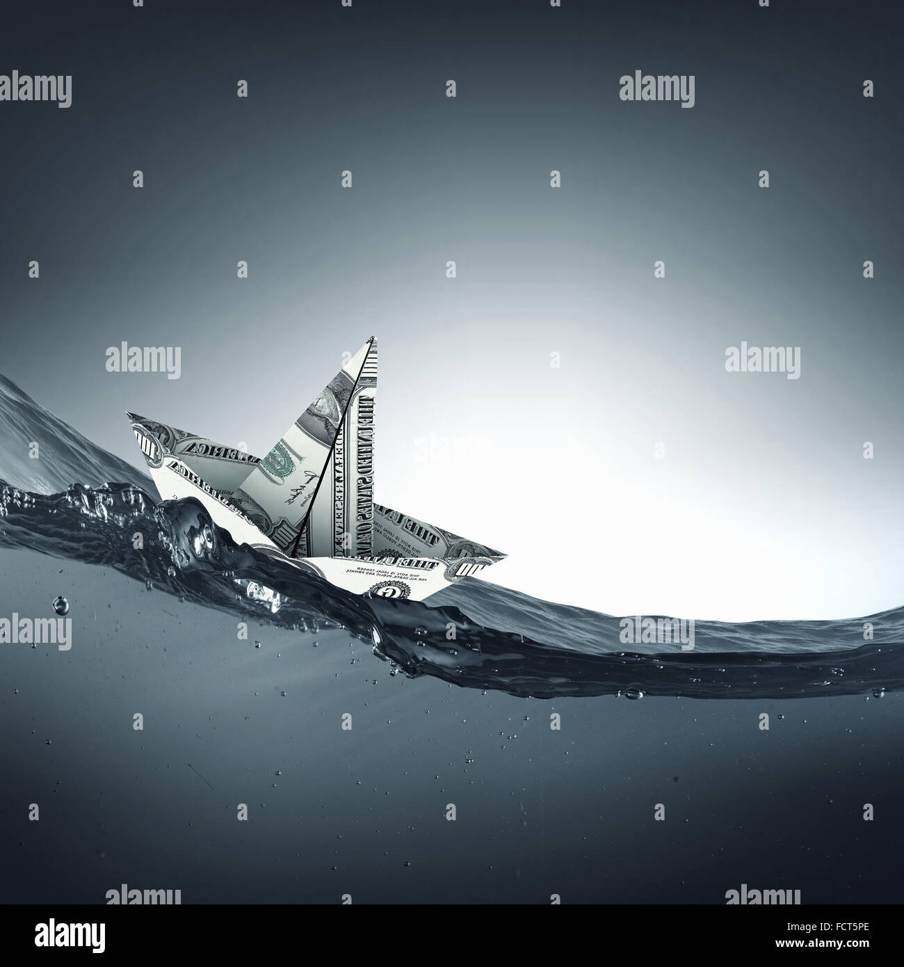 Ship made of dollar banknote floating in water Stock Photo - Alamy