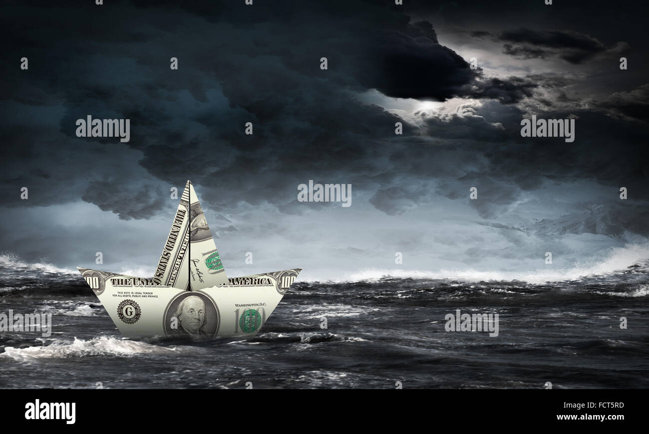 Ship made of dollar banknote floating in water Stock Photo - Alamy