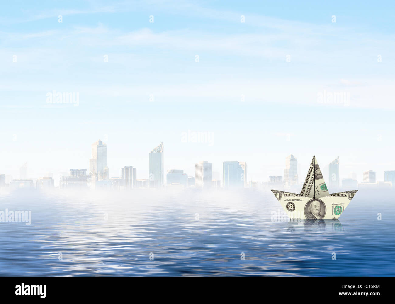 Ship made of dollar banknote floating in water Stock Photo - Alamy
