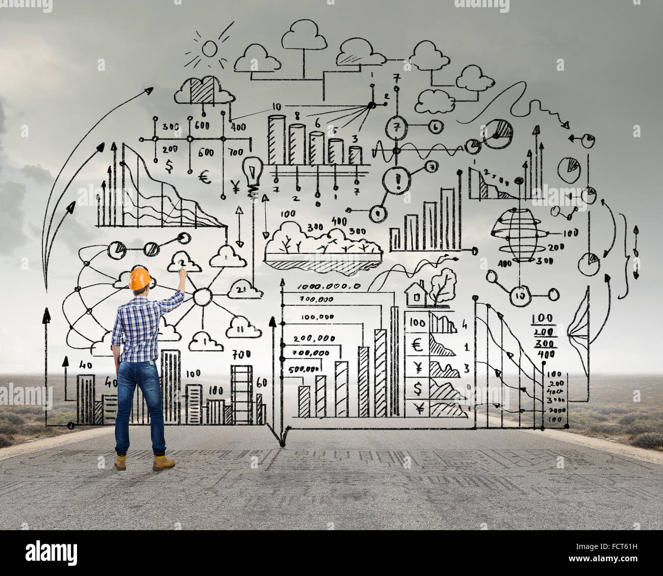 Back view of man engineer drawing plan sketches on wall Stock Photo - Alamy