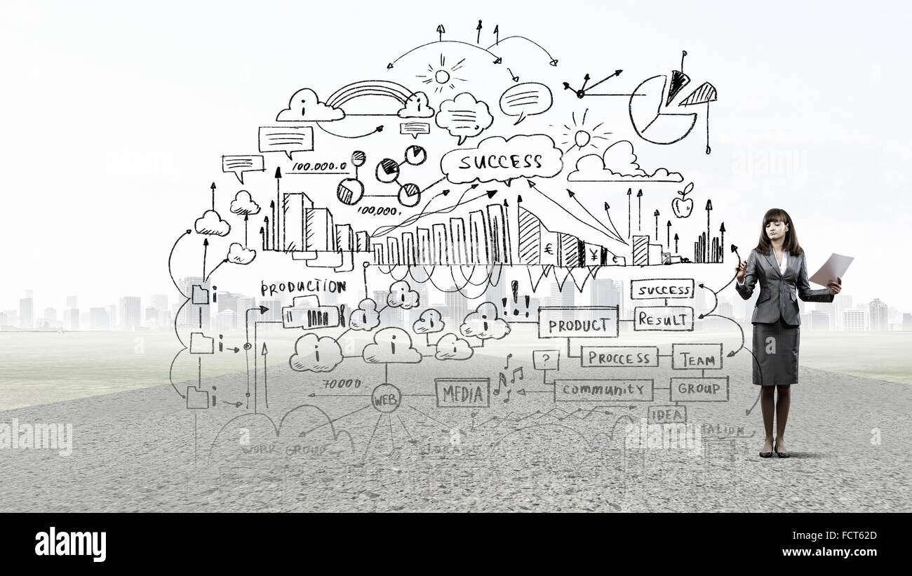 Young businesswoman drawing strategy plan on screen Stock Photo - Alamy