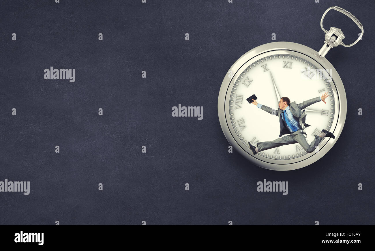 Concept of time with funny businessman running in a hurry Stock Photo ...