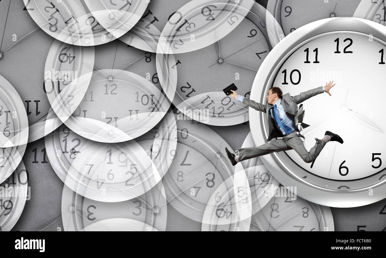Concept of time with funny businessman running in a hurry Stock Photo ...